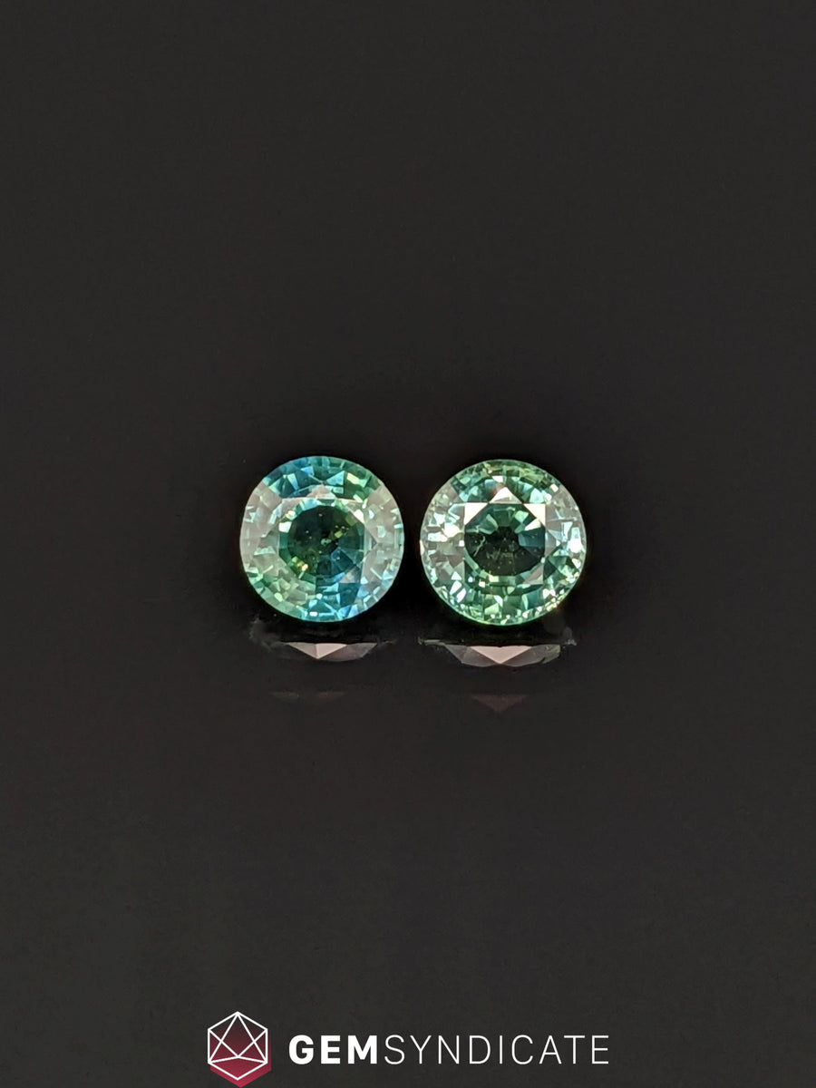 Splendid Round Teal Sapphire Pair 1.50ctw – The Gem Syndicate