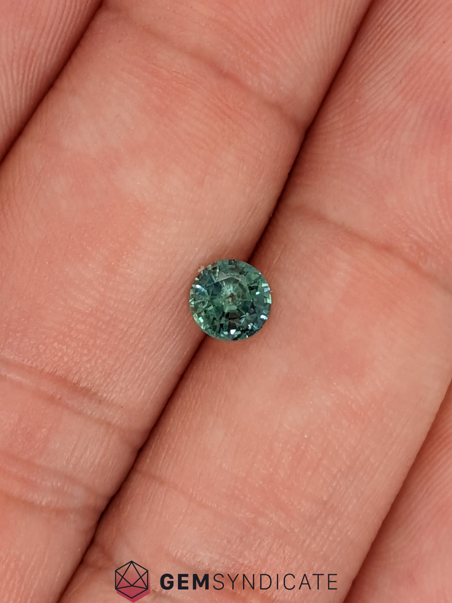 Flirty Round Teal Sapphire 0.67ct – The Gem Syndicate
